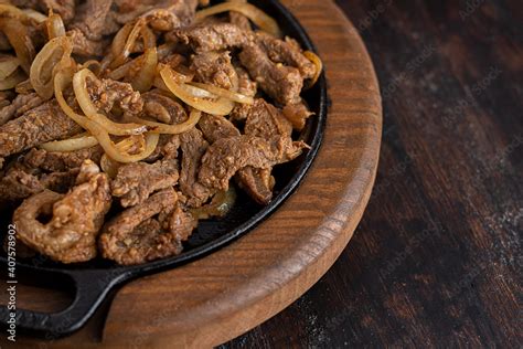 Foto De Contra Filé Acebolado Do Stock Adobe Stock