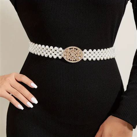 حزام مرن من اللؤلؤ الصناعي أنيق من حجر الراين بإبزيم معدني Temu Saudi