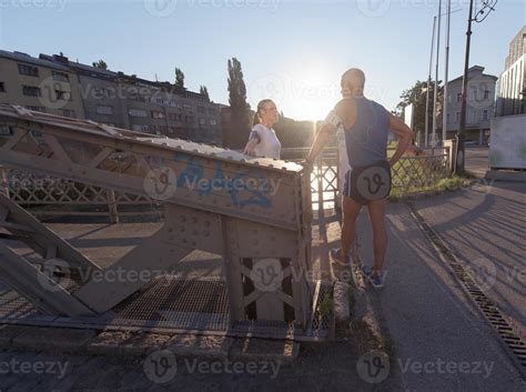 Jogging Couple Planning Running Route And Setting Music 10375755 Stock Photo At Vecteezy