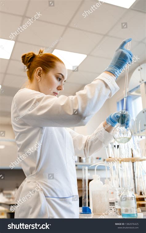 Girl Lab Mixing Chemicals Girl Holding Stock Photo 1382076425 Shutterstock