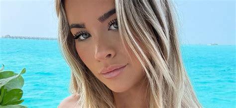 Emily Elizabeth Lets Massive Rack Pop Out Of Tiny Floral Bikini