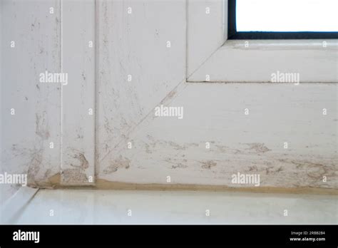 Part Of Dirty Window Frame After Installing Plastic Windows And Removing Duct Tape Stock Photo