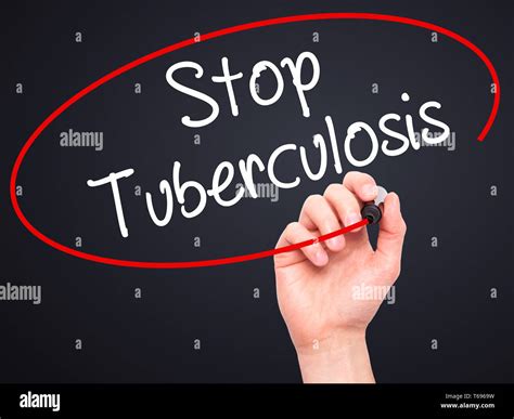 Man Hand Writing Stop Tuberculosis With Black Marker On Visual Screen