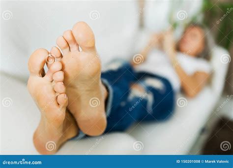 Female Bare Feet On Mawed Lawn Grass Young Woman Resting Outdoors Barefoot Take A Break