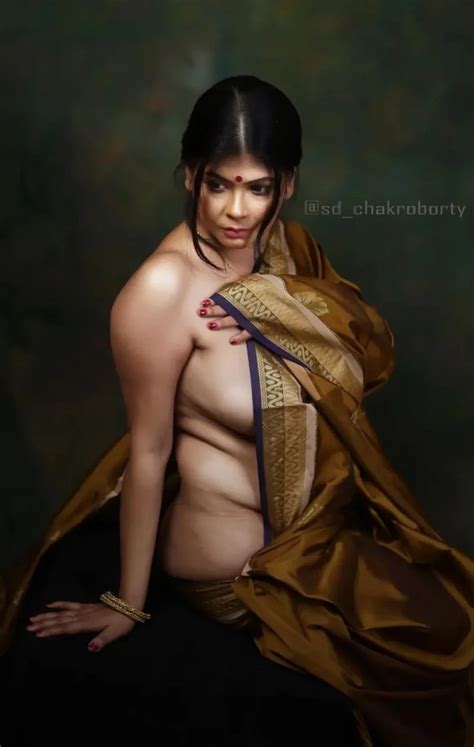Desi Model Posing Nude In Body Paint Hiding Her Big Rack But Showing Her Clean Shaven Pussy