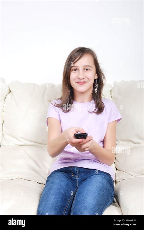 Girl With TV Remote Control Stock Photo Alamy