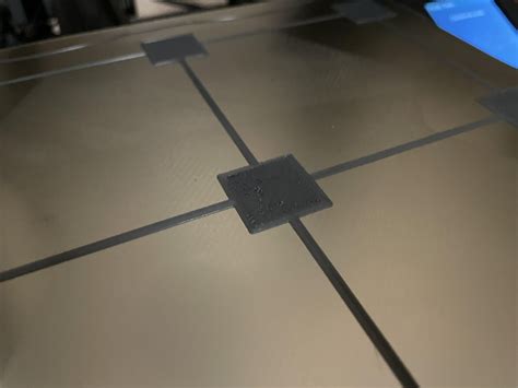 how can i fix those little blobs on top of the center square my