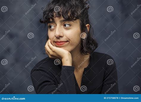 Portrait Of A Turkish Angora That Lies On A Golden Background Low