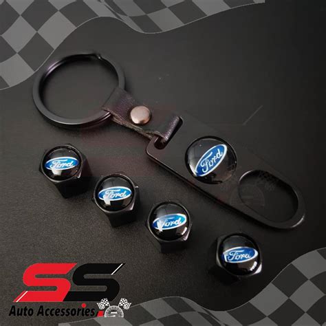 [รับประกันสินค้า] จุกลมยางรถยนต์ พร้อมโลโก้ จุกปิดลมยางพร้อมประแจ ฝาปิดจุกลม ยางรถยนต์ Ford 1