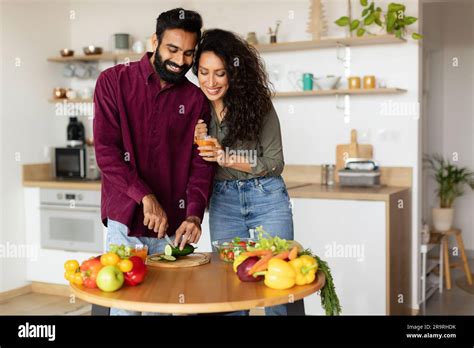 Loving Arab Man Husband Cooking Delicious Healthy Dinner For His Young