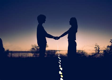 Lovers Holding Hands Sunset