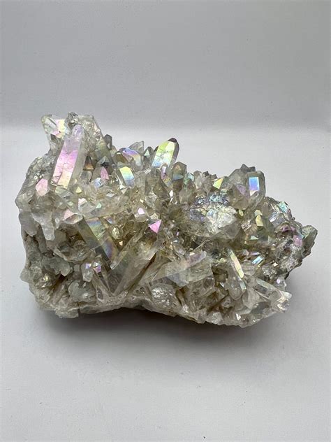 Man Made Crystals Explained Metaphysical Properties Of Opalite Goldstone Aura Quartz And