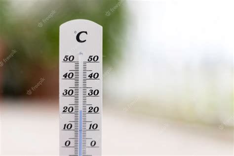 Premium Photo Heatwave Thermometer In Summer On A Blurry Background Heat