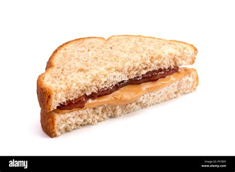 Classic Peanut Butter And Strawberry Jelly Sandwich On Wheat Bread