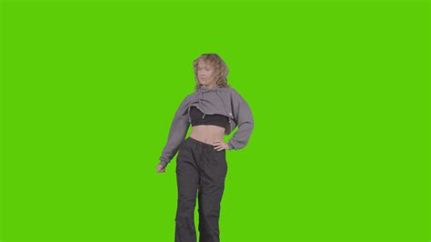 Free Stock Video Studio Shot Of Babe Woman Having Fun Dancing Against Green Screen