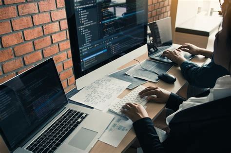 Premium Photo Two Partnerships Developing Programming And Coding Technologies Working On