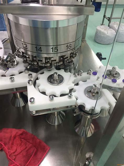 钠钙玻璃瓶轧盖机制药机械技术网