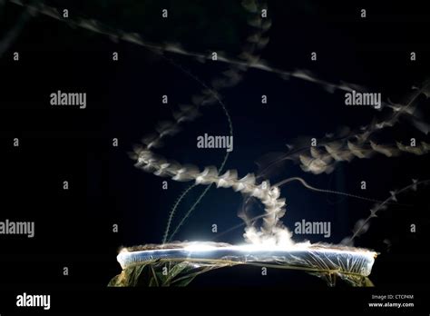 Time Lapse Photo Showing The Flight Pattern Of Moths Attracted To