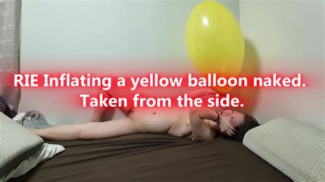 RIE And S RIE Inflating A Yellow Balloon Naked Taken From Side ManyVids