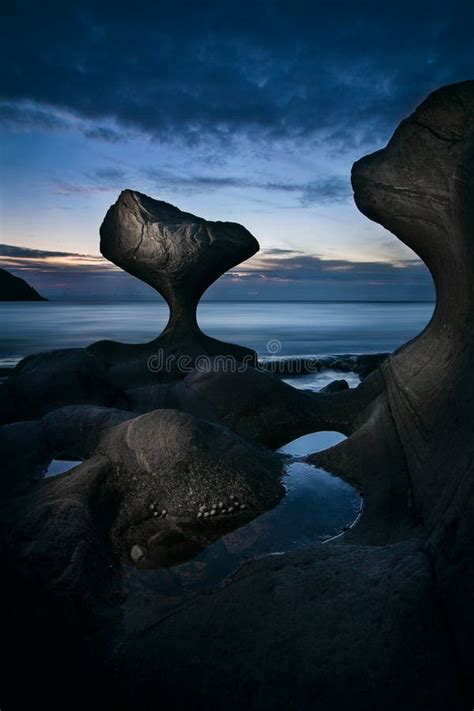 Vertical Shot Of The Kannesteinen Rock And Sea In A Beautiful Rocky