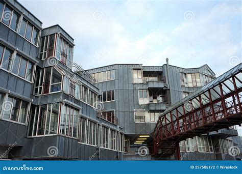 Modern Architectural Gray Building With The Overpass Side View Stock