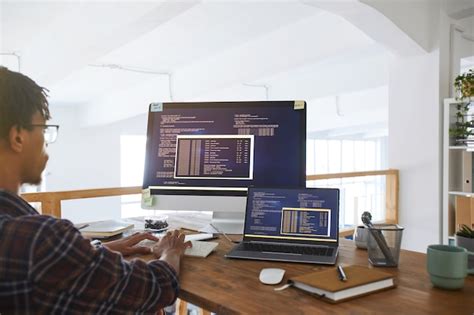 Premium Photo Portrait Of African American It Developer Typing On
