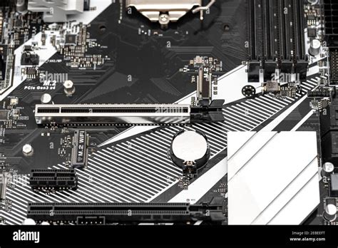 A Modern Motherboard Of A Desktop Computer In Black Color With A Visible PCI Express Connector