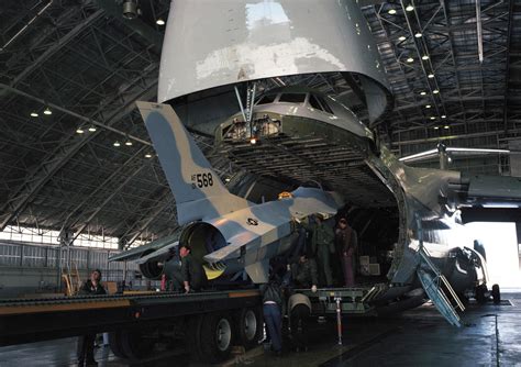 Yf 16 Prototype Being Unloaded From A C 5a Galaxy Inside A Hanger At