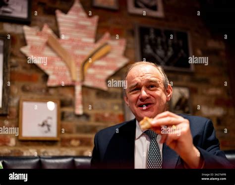 Liberal Democrats Leader Sir Ed Davey Eats Some Food At The Canadian