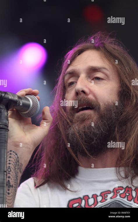 Black Crowes Front Man Chris Robinson Is Shown Singing On Stage During