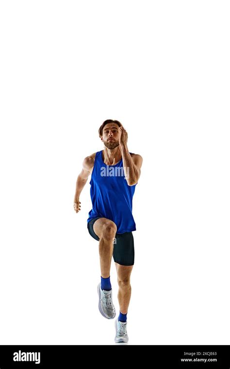 Dynamic Image Of Competitive And Forced Man Muscular Runner In Motion Training Isolated On
