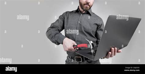 Unshaven Man Cropped View Break Laptop Hitting Computer With Hammer Grey Background Hardware