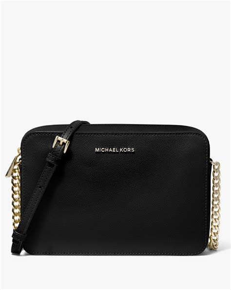 Mk Round Sling Bag At Abby Choi Blog