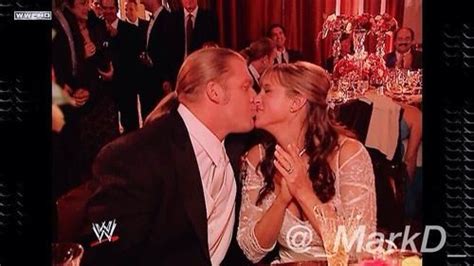 Triple H And Stephanie Mcmahon Kissing