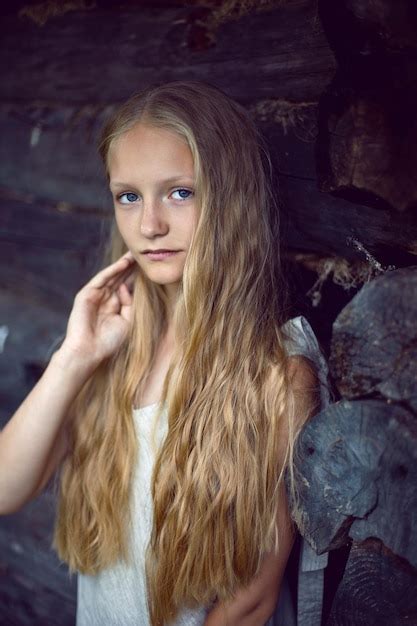 Premium Photo Portrait Of A Beautiful Village Girl Blonde With Long