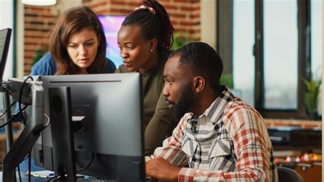 Premium Photo Group Of Software Developers Using Creative Skills To Plan New Advanced