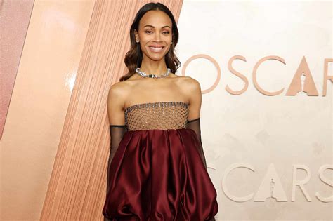 Zoe Saldaña Reinvents Her Wardrobe In Dark Red Ruffled Gown And Sheer