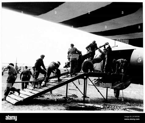 Paratroop Preparations For Invasion Gliders Are Loaded By Airborne