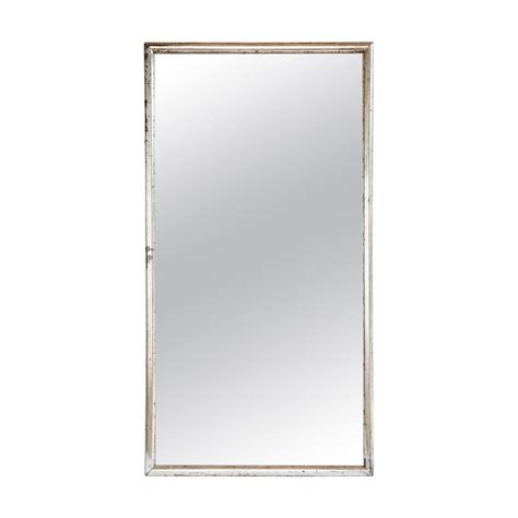 Striking Big Black Carved Wood Rectangular Mirror With Aged Glass At