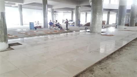 งานปูพื้นชั้น๑ อาคารพระพุทธศรีสัพพัญญู พุทธอุทยานนครสวรรค์