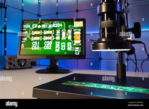 Inspection Of The Quality Of Silicon Chips In The Laboratory With A Microscope Stock Photo Alamy