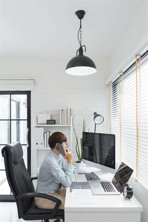 Software Development Concept Male Programmer Talking On Smartphone And