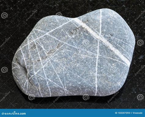 A Big Raw Specimen Of Dark Basalt Rock Isolated On White Background