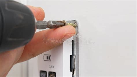 Installation Of A USB Type C Socket At The Head Of The Bed For Charging Devices Stock Image