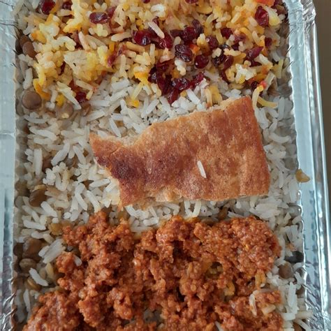 خرید و قیمت عدس پلو با برنج ایرانی و گوشت چرخ کرده و زرشک و زعفران از