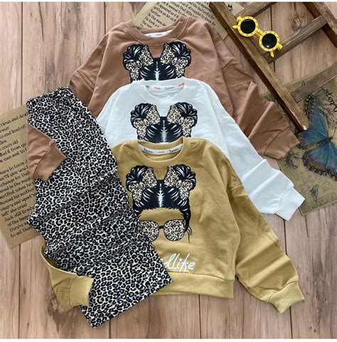 کراپ شلوار دختر عینکی پلنگی فروشگاه پوشاک کودک