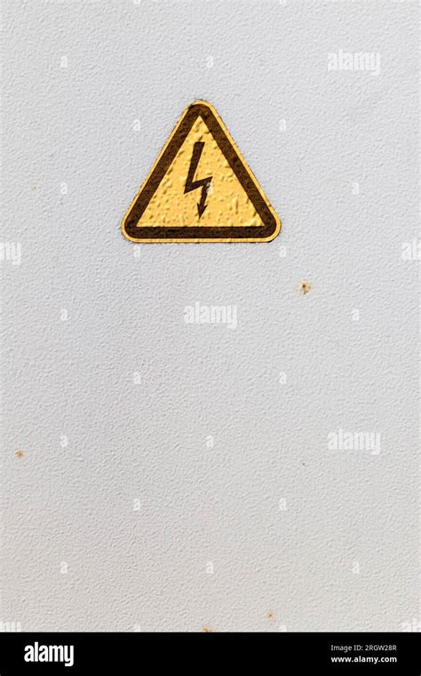 A Sign On A Metal Box About A Warning About The Danger From Electricity