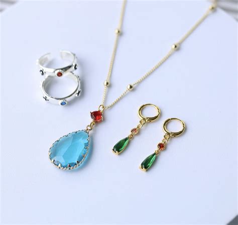 Pin by moo on jewelry | Castle earrings, Castle jewelry, Howls moving ...