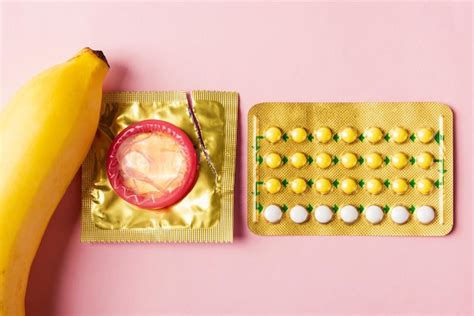 Premium Photo Condom On Wrapper Pack Banana And Contraceptive Pill