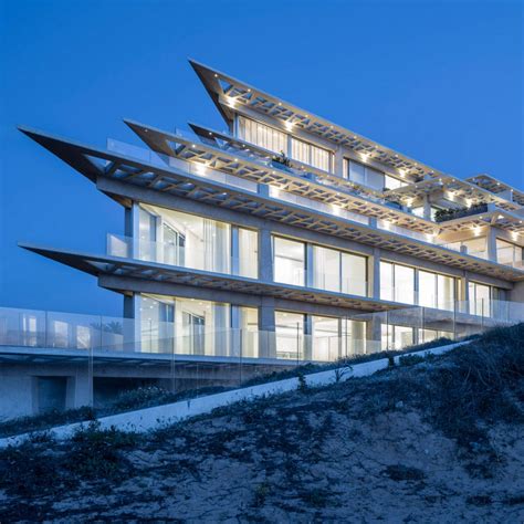 Perforated Canopies Shade Terraces Of Cliff Top Apartments In Israel